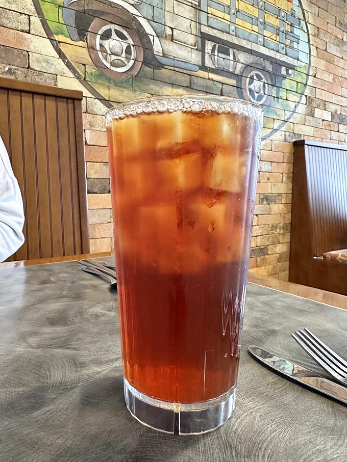 That's not just iced tea – it's liquid refreshment elevated to art form, served in a glass tall enough to keep you hydrated through Florida's famous heat.