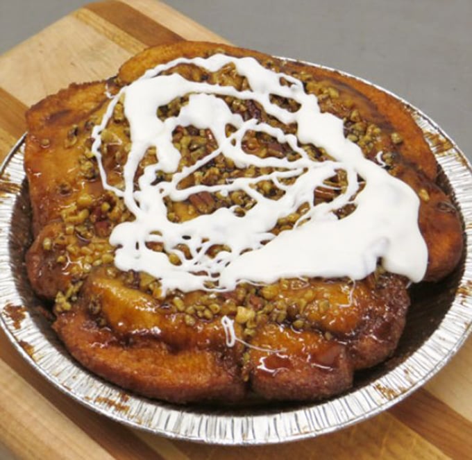 This isn't just a pecan pull-apart—it's architecture you can eat. The white icing drizzle adds that perfect touch of sweetness that makes resistance completely futile.