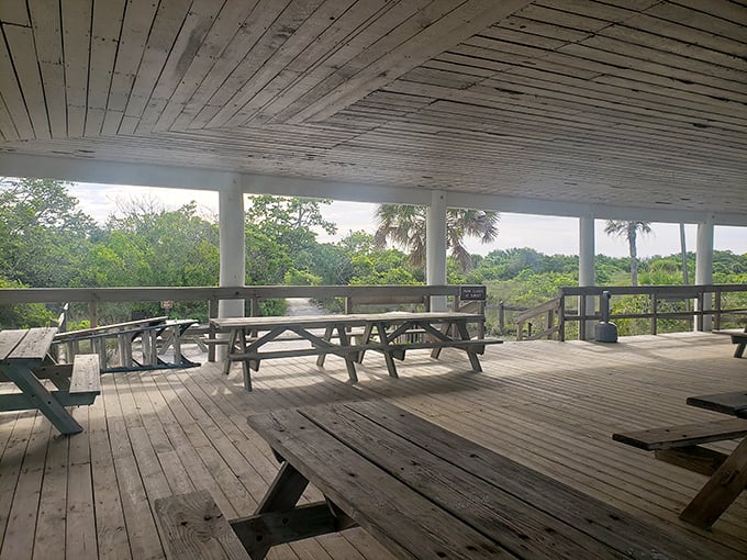 This weathered picnic pavilion has witnessed countless family gatherings and sandwiches with that special ingredient—a sprinkle of beach sand.