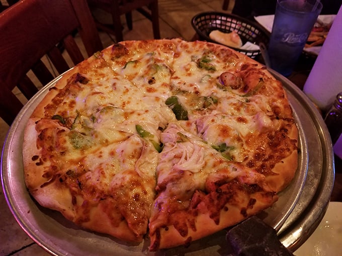 This isn't just pizza—it's scratch-made evidence that Ziffle's refuses to be pigeonholed as "just a BBQ joint." Those bubbling cheese islands tell the whole story.