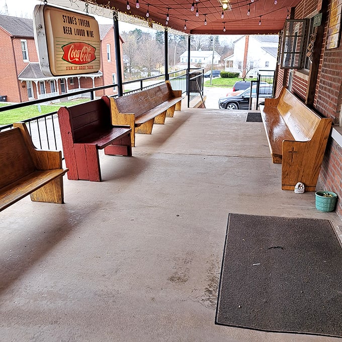 The front porch with its church pew seating—where patience is rewarded as you wait for a table on busy nights.
