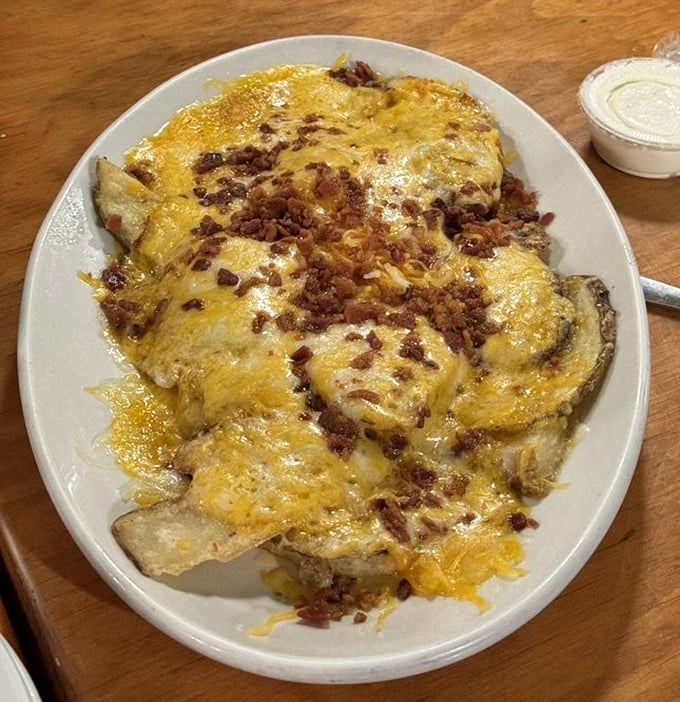 These aren't just potato skins—they're golden boats of cheese and bacon sailing straight to your heart's desire.