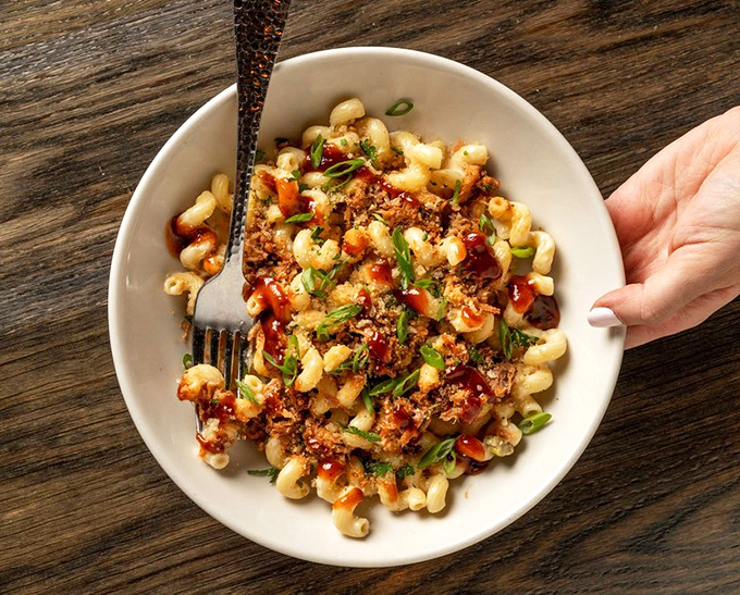 This pulled pork mac and cheese doesn't just break the rules—it rewrites them. Comfort food that's had a sophisticated glow-up.