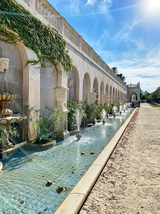 A wall of fountains that makes your bathroom shower pressure seem deeply inadequate. Renaissance-inspired elegance with modern hydraulic muscle.