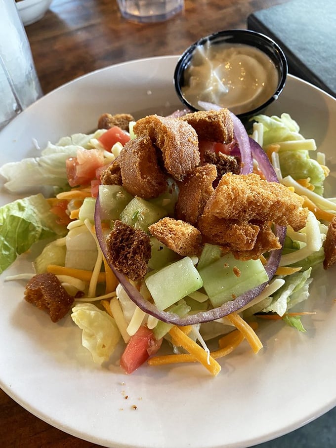 A salad that doesn't apologize for being a salad – crisp, colorful, and crowned with crunchy toppings that mean business.
