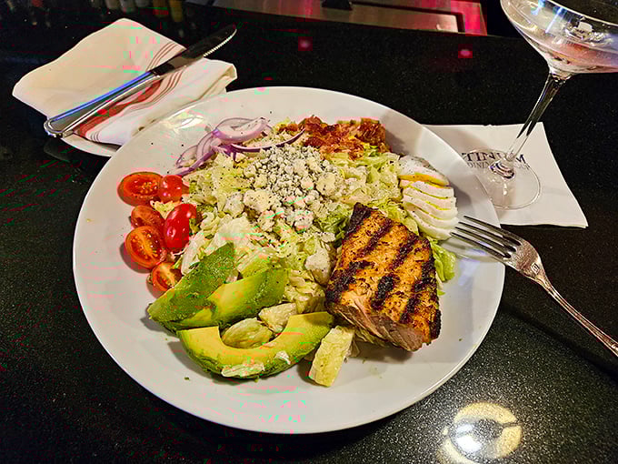 A salad that doesn't apologize for being healthy—grilled protein, avocado, and fresh vegetables in perfect harmony like a nutritious boy band.