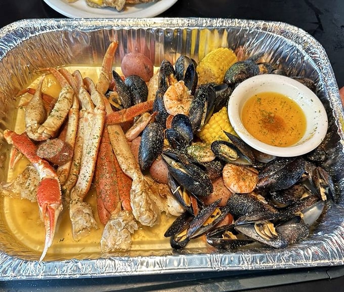 A seafood feast that would make Neptune himself put down his trident and pick up a bib—oceanic abundance meets butter-drenched bliss.