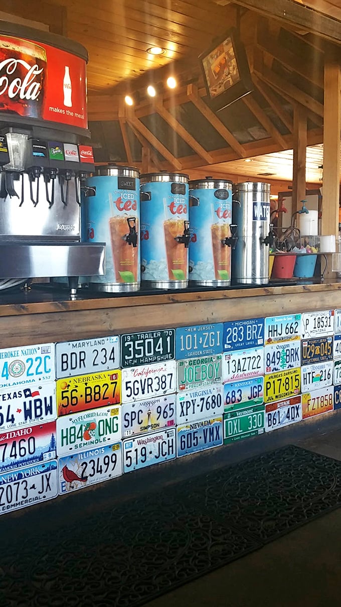 License plates from across America line the beverage counter – evidence that good barbecue is worth crossing state lines for.