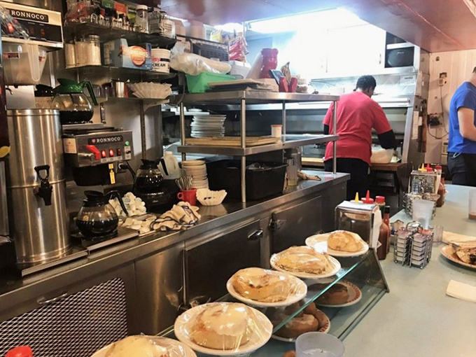 Where the magic happens – fresh pies cooling like a scene from a Norman Rockwell painting that you can actually eat.