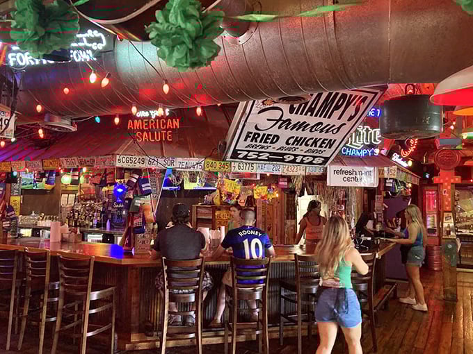 Every inch of wall space tells a story at Champy's, with license plates and memorabilia creating a museum of Americana you can eat in.