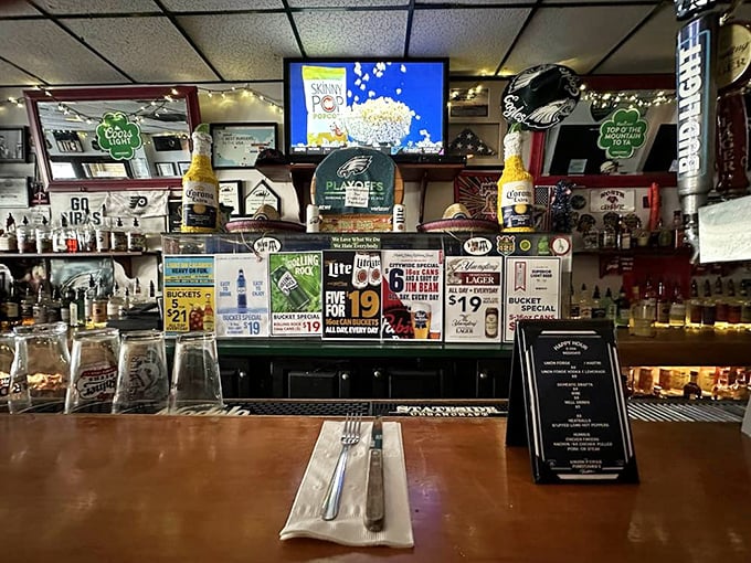 Every inch of wall space tells a story at Nick's—from framed jerseys to vintage photographs, it's a museum of Philadelphia pride with beer on tap.