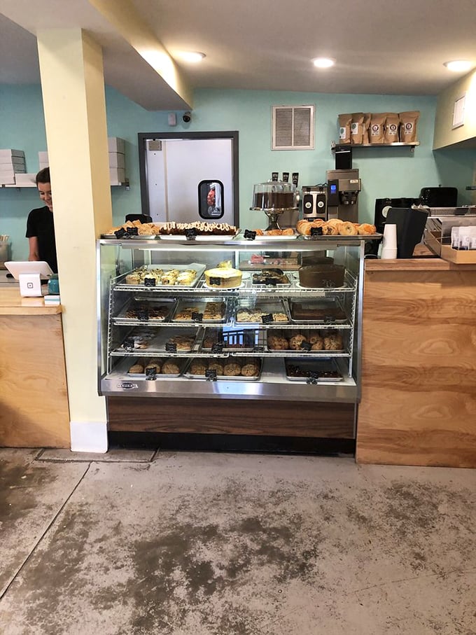 Another view of the bakery's display case—a glass-fronted gallery where pastry becomes art and willpower goes to die.
