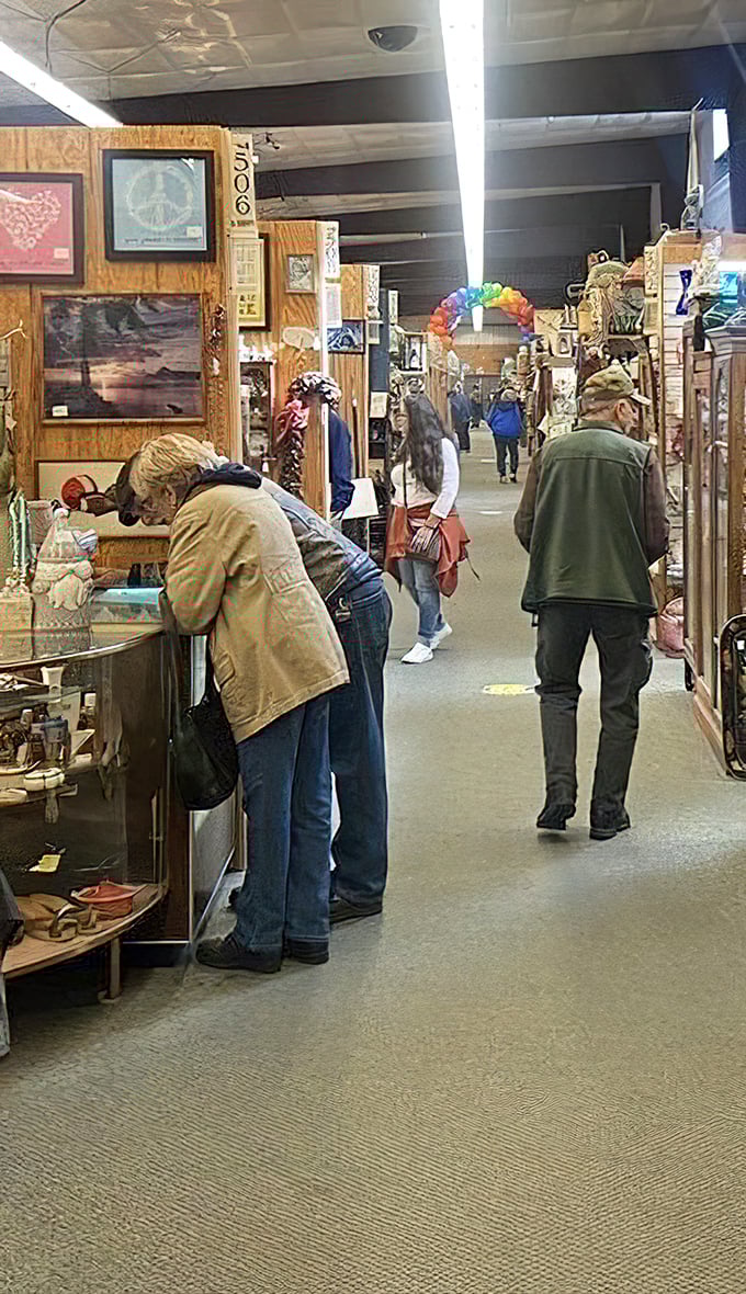 The universal posture of antique shoppers: slightly hunched, completely focused, and utterly lost in the thrill of the hunt for that perfect something.