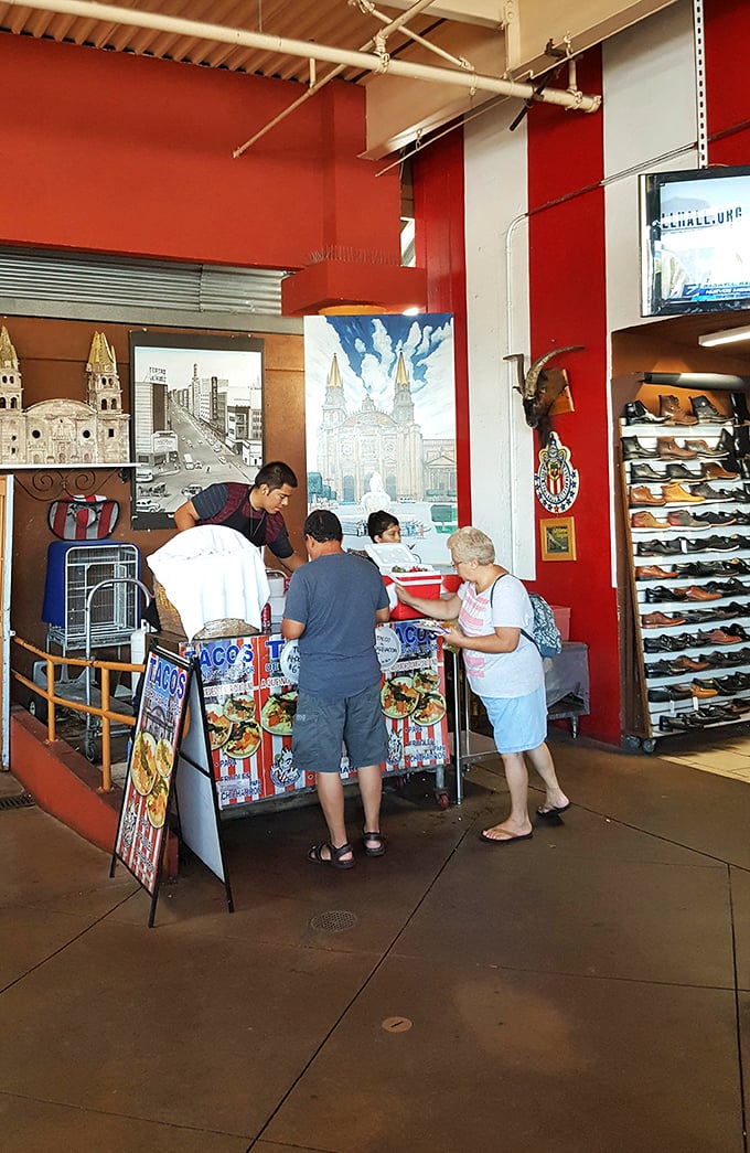 Taco time at the swap meet – where multitasking means eating lunch while mentally calculating remaining bargain-hunting time.