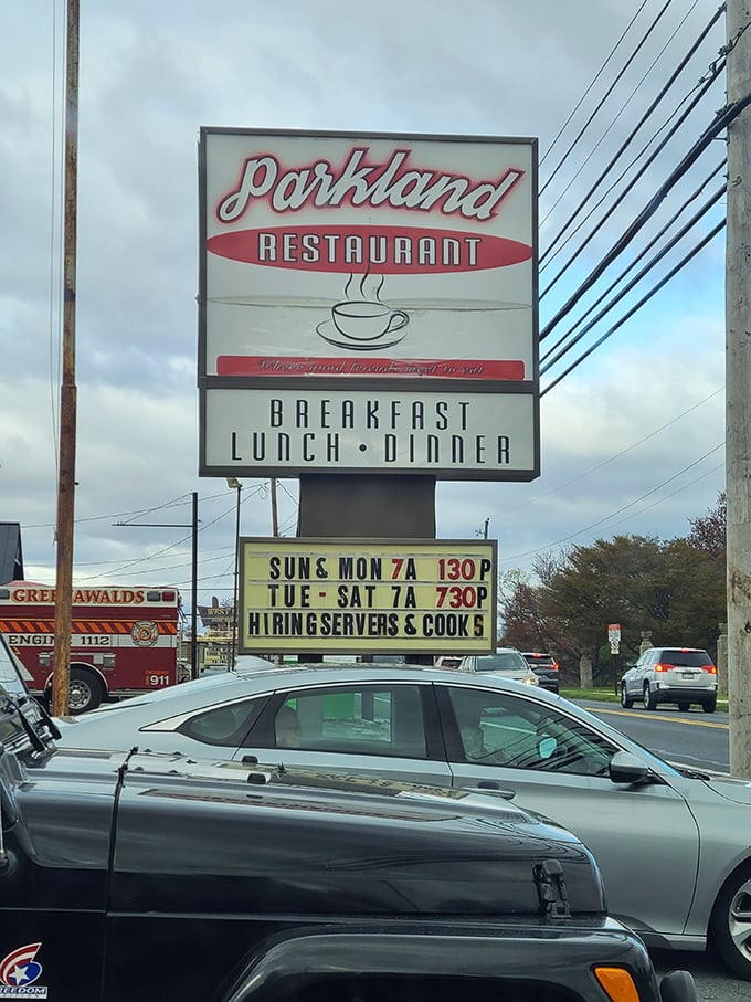 The roadside sign that's guided hungry travelers for generations. Those hours of operation? Consider them your window to pancake nirvana.