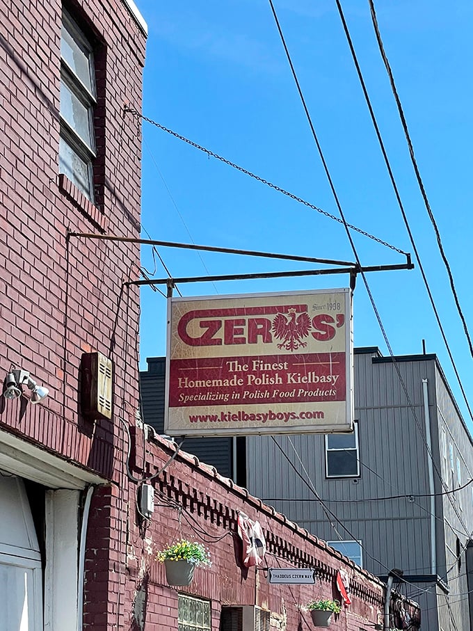 The sign swinging above Tilton Street—a beacon for those seeking authentic Polish flavors in Philadelphia's Port Richmond neighborhood. 
