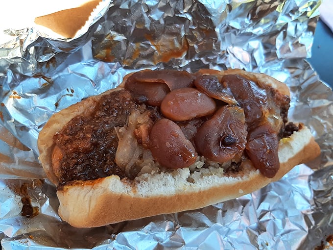 The legendary Squeeze Dog with beans—proof that sometimes the messiest foods create the most pristine memories.