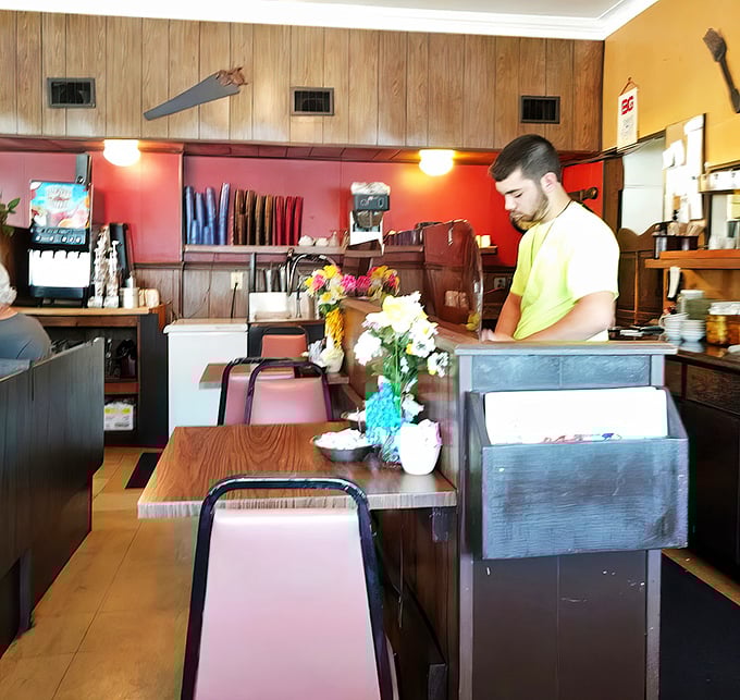 Pink booths and fresh flowers—where small-town charm meets your morning coffee ritual.