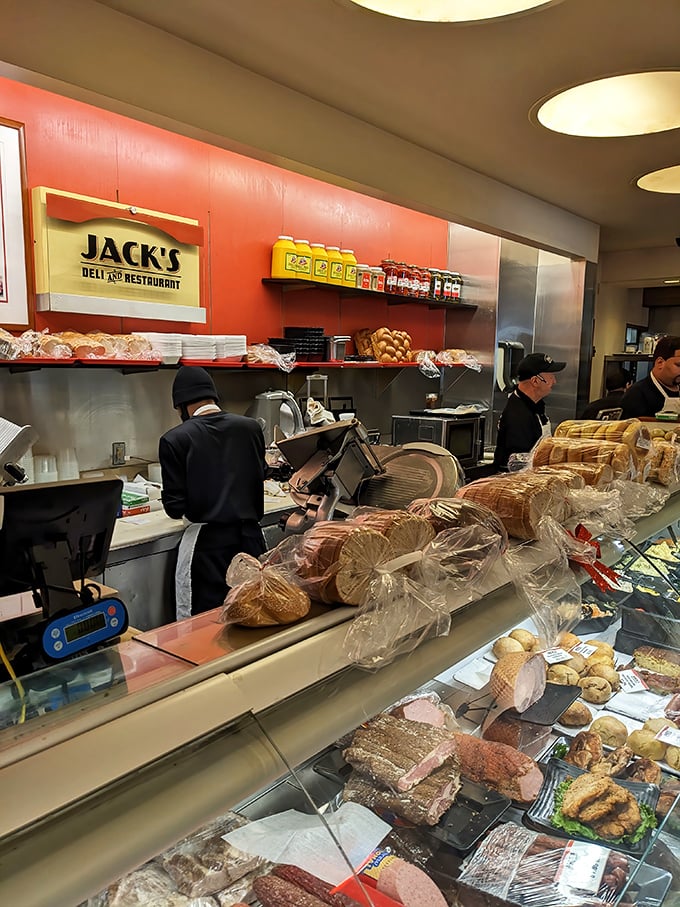 Behind the counter, the real magic happens. These aren't just staff – they're the keepers of delicious traditions and perfect sandwich ratios. 