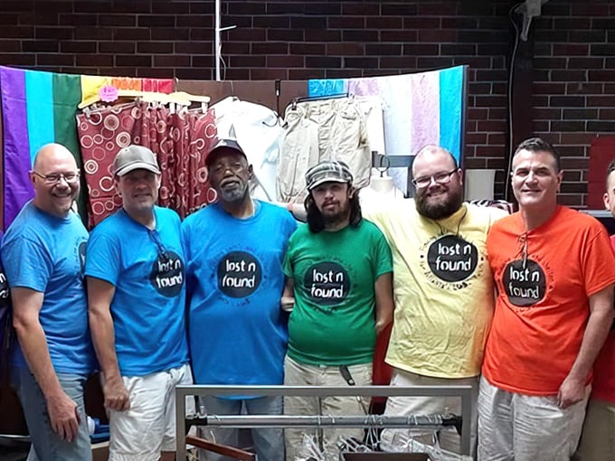 The colorful staff embodies the store's mission, wearing their commitment to helping LGBTQ+ youth as proudly as their rainbow shirts.