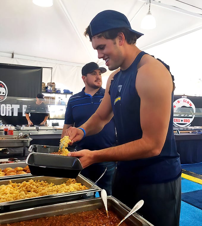 The sacred ritual of mac and cheese service. In barbecue culture, sides aren't afterthoughts—they're essential supporting characters.