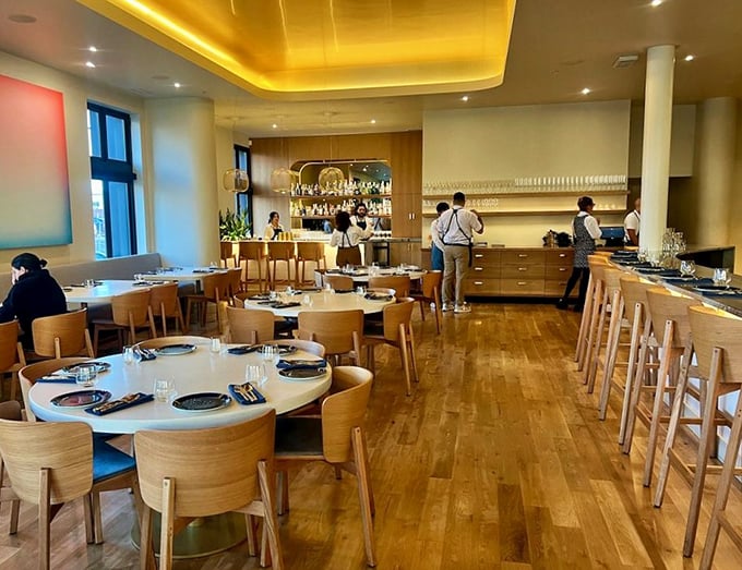 Where the magic happens. The open kitchen design lets you witness the choreographed dance of culinary professionals turning ingredients into art.