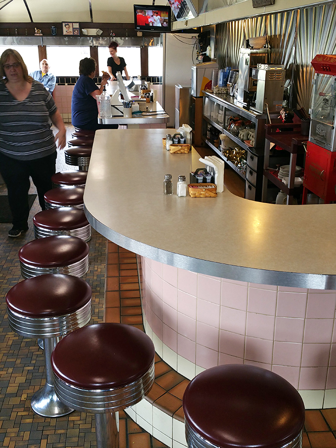 Where diner dreams come true – the counter staff orchestrating the morning rush with the precision and grace of seasoned performers.