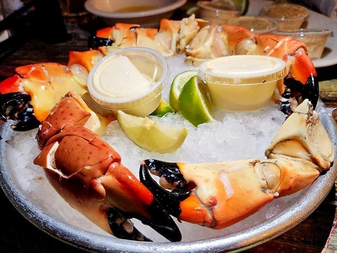 Stone crabs served with the respect they deserve – on ice with dipping sauces that complement rather than overwhelm their sweet, delicate meat.