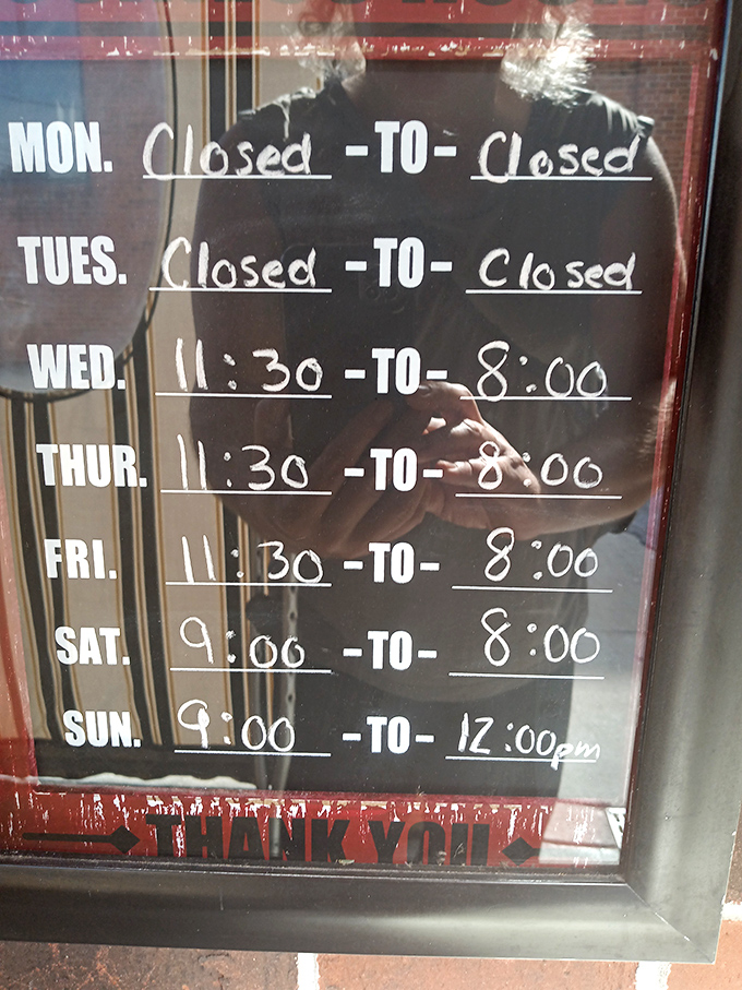 Hours posted with chalk and honesty – the kind of place that closes when it should and opens when you need it.