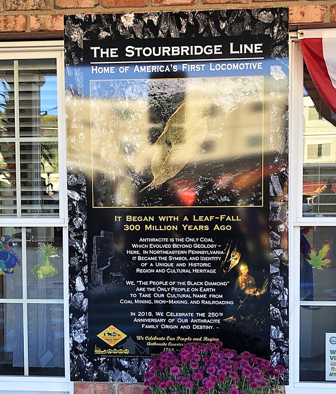 History isn't just preserved here—it's celebrated daily, with this plaque reminding visitors they're walking in the footsteps of America's earliest railroad pioneers.