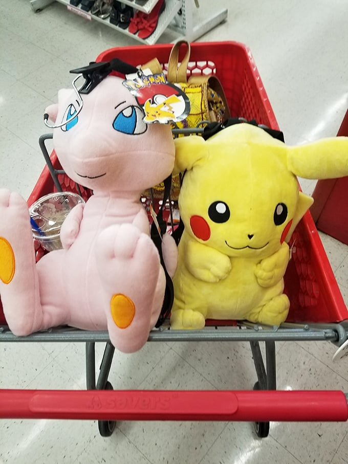 Pikachu and friends waiting for their forever homes—proof that even stuffed celebrities end up at Savers eventually.