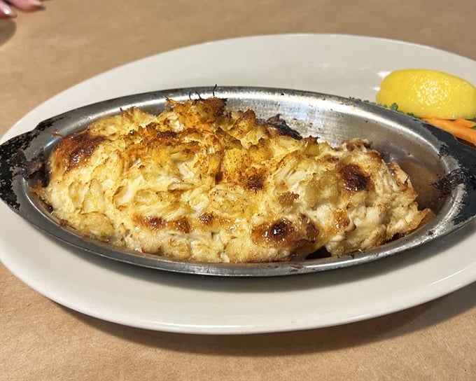 Stuffed mushrooms on a sizzling platter, because vegetables deserve their moment in the spotlight too.