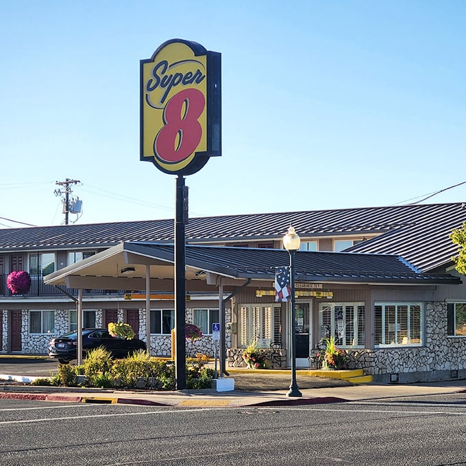 The Super 8 offers weary travelers a stone-accented welcome – proof that even chain hotels adapt to Alturas' rustic charm.