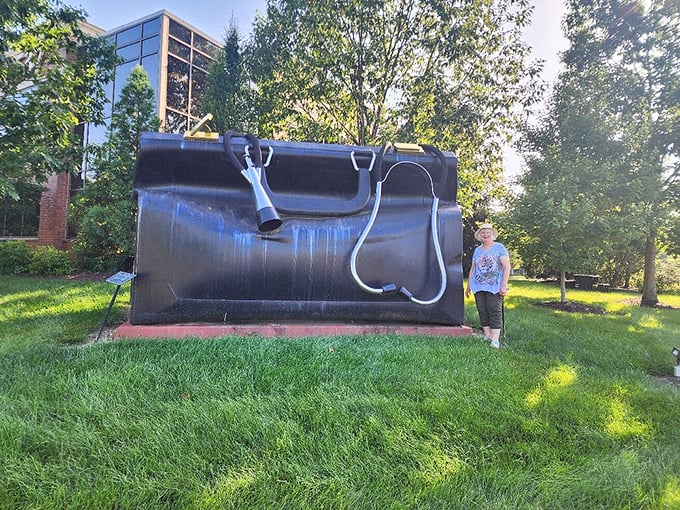 Every visitor develops their own signature pose with the bag. This one says, "I'm not a doctor, but I play one next to giant props."
