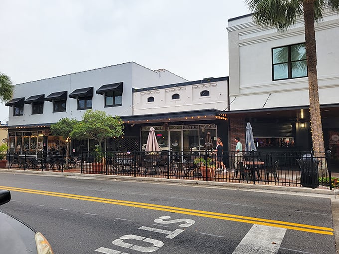The Brick & Barrel's inviting outdoor seating area practically whispers "stay awhile" to passersby—the perfect stage for people-watching and plate-sharing.