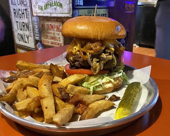 The legendary Thurman Burger in its natural habitat – surrounded by hand-cut fries and a pickle, awaiting its destiny.