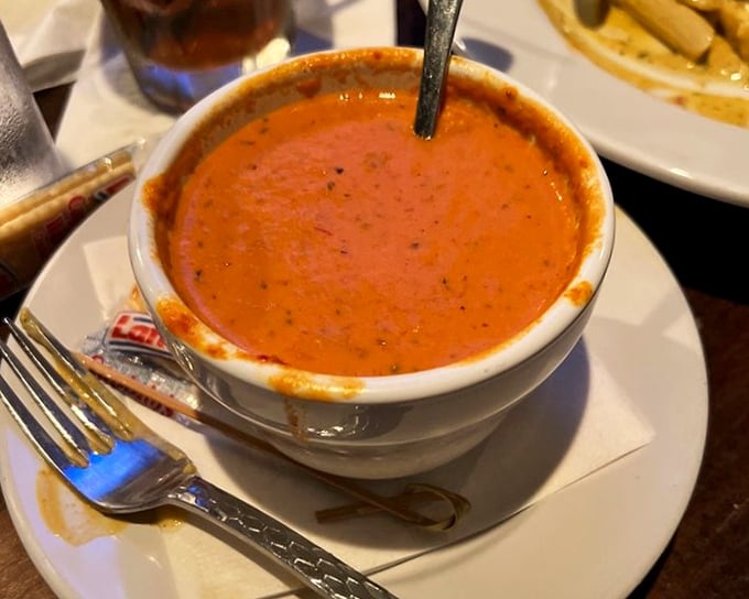 This tomato bisque doesn't whisper—it announces itself with authority. The kind of soup that makes you wonder why you ever bothered with the canned stuff.