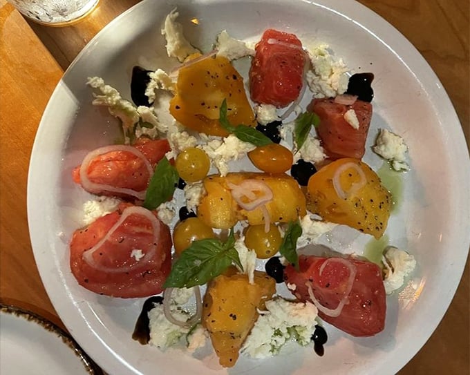 Heirloom tomato salad that tastes like summer decided to show off. The kind of dish that makes you forgive tomatoes for being bland the rest of the year.