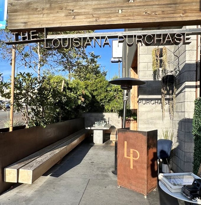 The entrance says "we're serious about design" while the bench says "but not too serious to enjoy yourself." Perfect California-meets-Louisiana balance.
