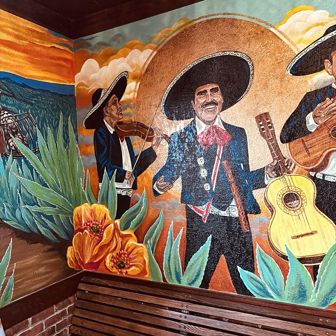 Wall art that doesn't just decorate—it transports. These mariachi musicians have serenaded countless happy diners through their meals.
