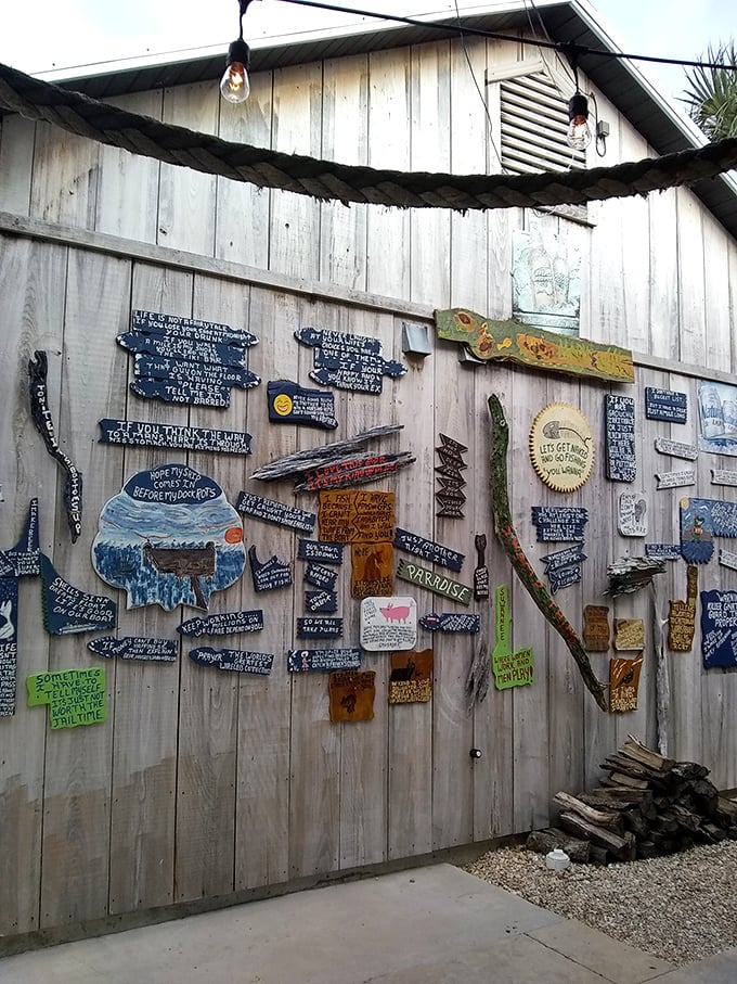 A wall of wooden wisdom and coastal quips that tells you this place doesn't take itself too seriously—just its seafood.