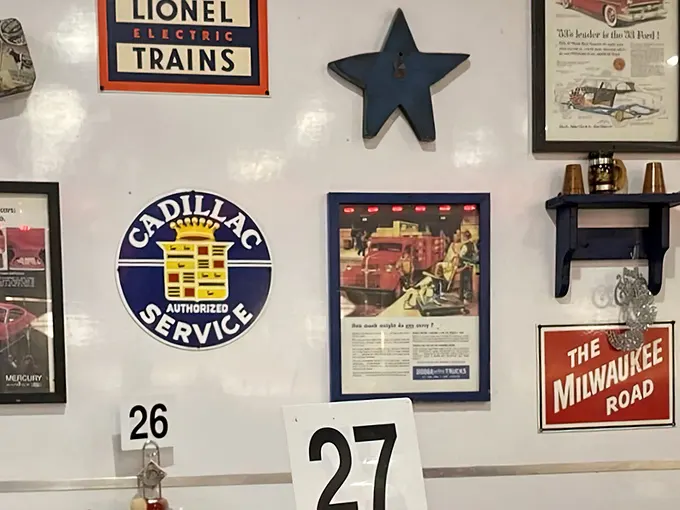 Wall décor that tells stories of American nostalgia—from Lionel trains to Cadillac service, each sign a chapter in our collective memory.