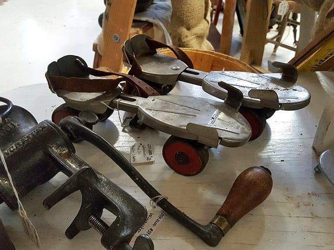 Vintage roller skates and hand-crank tools—childhood joy and adult labor sitting side by side like old friends sharing stories.