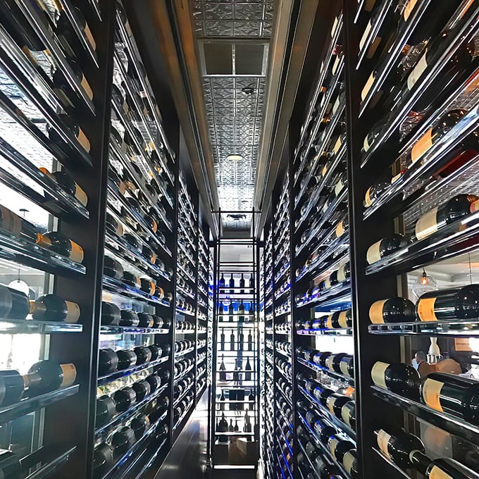 This wine collection isn't just impressive—it's a floor-to-ceiling monument to the understanding that great seafood deserves equally great wine.