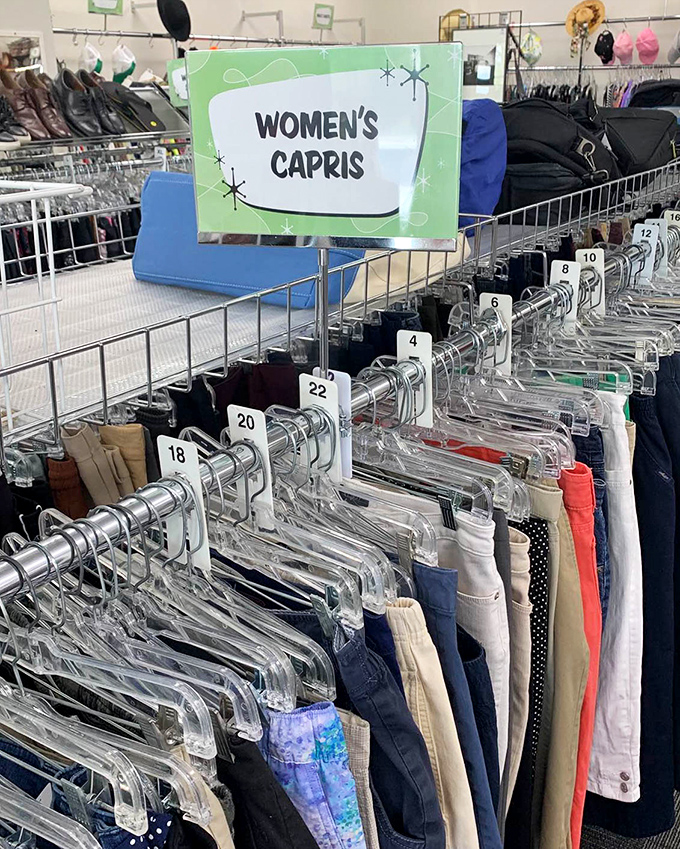 The women's capri section stands ready for summer, organized by size—a thoughtful touch that saves precious shopping time.
