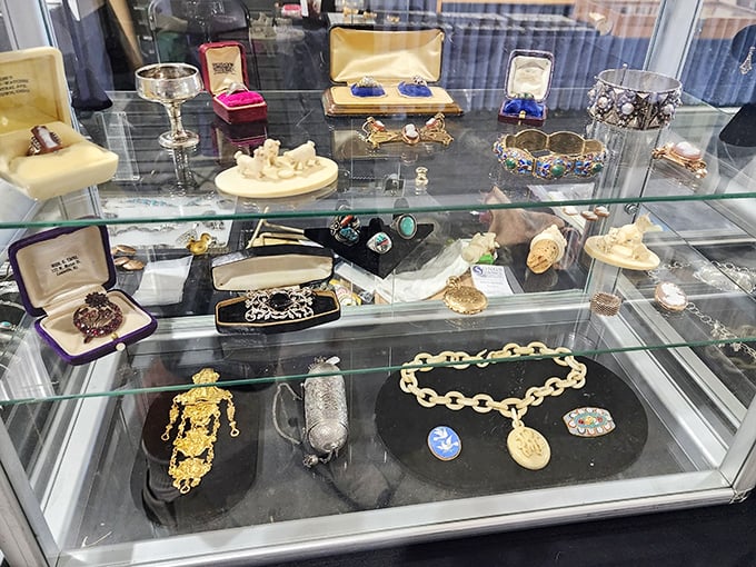 Behind glass, vintage jewelry waits for new wrists and necks – each piece carrying stories from decades past, ready for new chapters to begin.