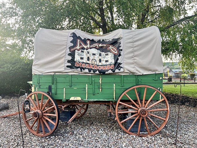 This covered wagon outside isn't just decoration – it's how they haul in the massive quantities of beef needed to satisfy the hungry hordes.