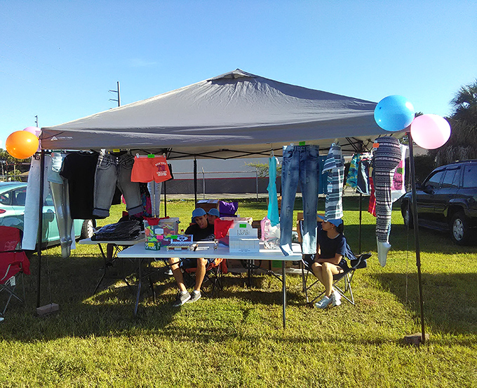 Fashion democracy in action—designer labels mingling with vintage finds under the same Florida sunshine.