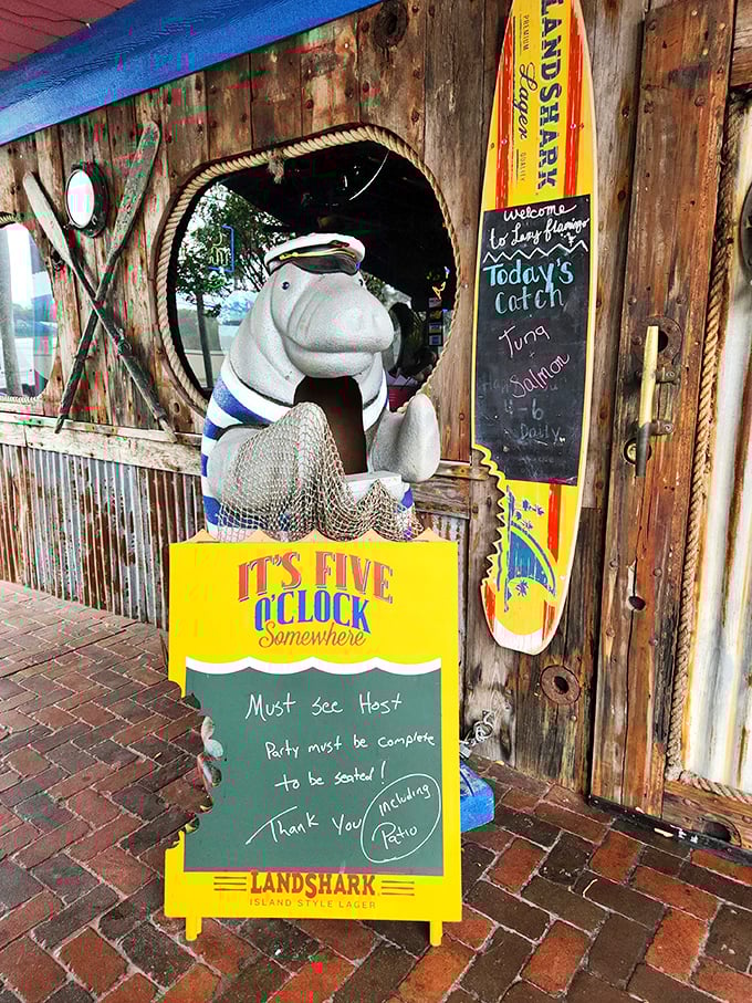 "It's Five O'Clock Somewhere" isn't just a saying here—it's a lifestyle philosophy endorsed by this nautical manatee greeter.