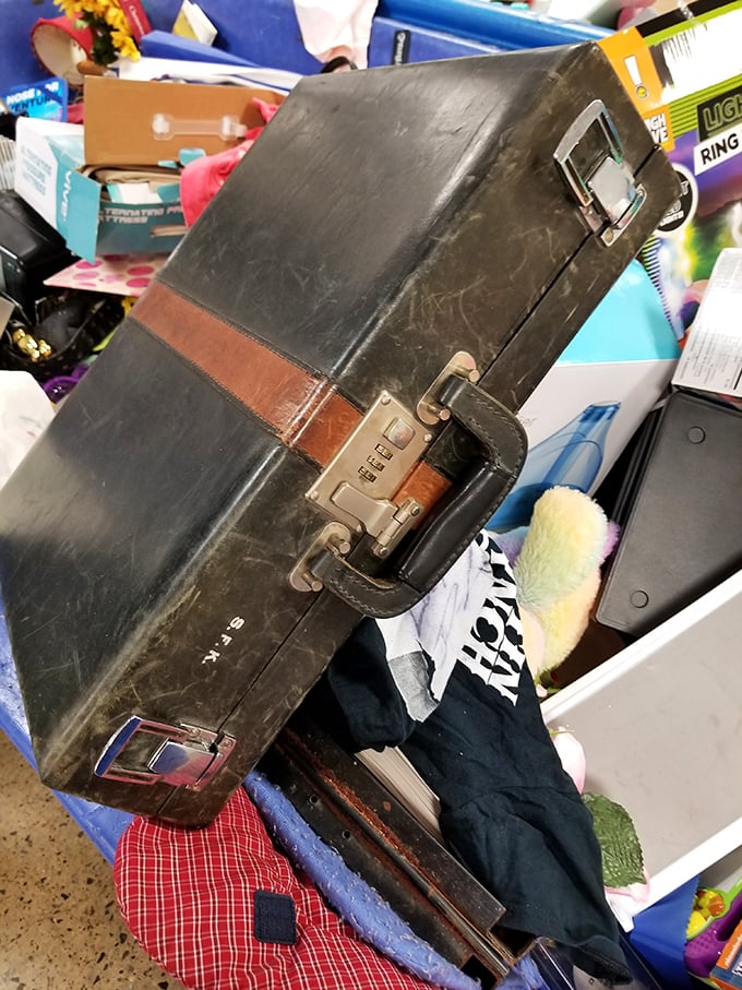 That vintage attaché case has seen things – business deals, important documents, and possibly a martini lunch or two in its distinguished career.